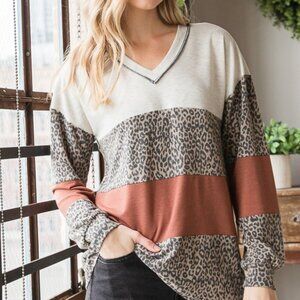 HEIMISH USA | Tops | Solid Color Block And Animal Top With Stitch ...